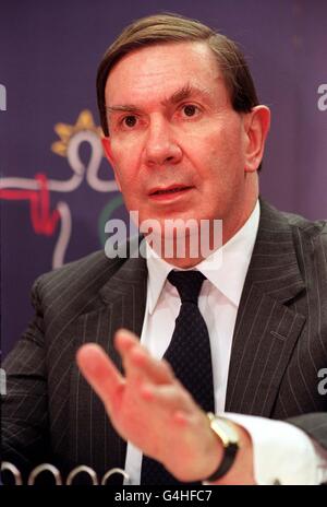 Lord Chancellor Lord Irvine and Garry Hart (right, facing) an advisor ...