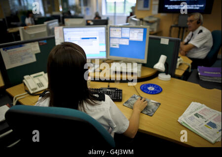Police staff take non-emergency calls from members of the public on the ...