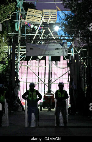 Police officers stand guard at the entrance to the Burgenstock Resort ...