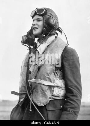 World War Two Fighter Pilot in Leather and Goggles Smoking a Cigar ...