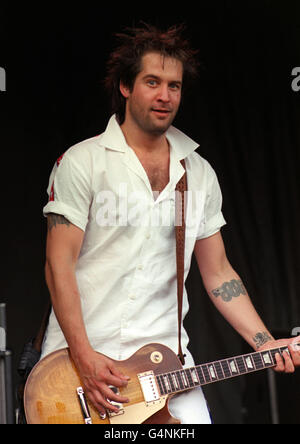 Mark Yates, guitarist with the rock band Terrorvision, performing on ...