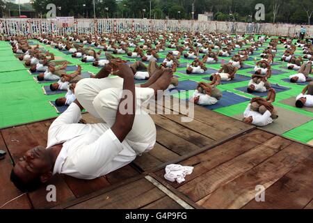 People practice Yoga ahead of International Day of Yoga at Marina Beach ...