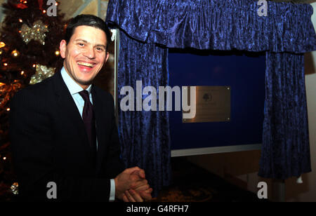 South Shields MP David Miliband, (right), is seen with Aran Handa ...