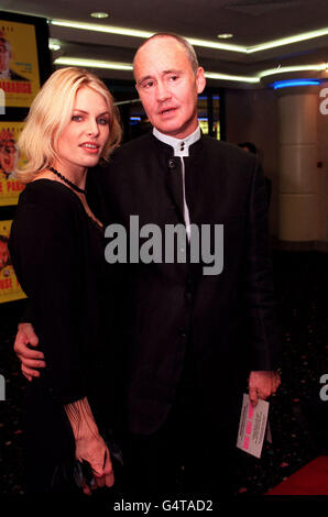 Actor, comic and writer Nigel Planer and his wife arrive for the ...