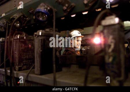 A miner at the 90 year old Ellington Colliery in Northumberland puts ...