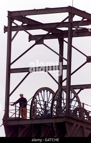 A miner at the 90 year old Ellington Colliery in Northumberland puts ...