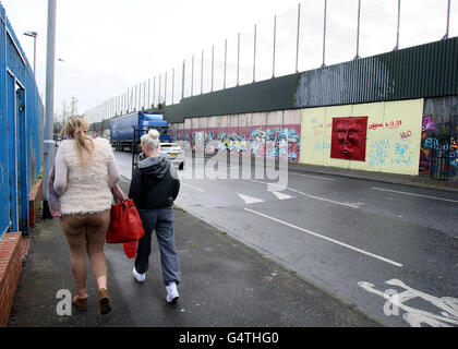 The largest peace wall in Belfast, at Cupar Way, which separates the ...