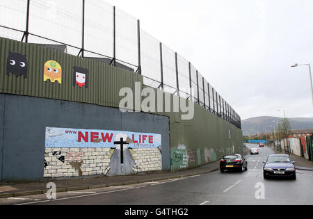 The largest peace wall in Belfast, at Cupar Way, which separates the ...