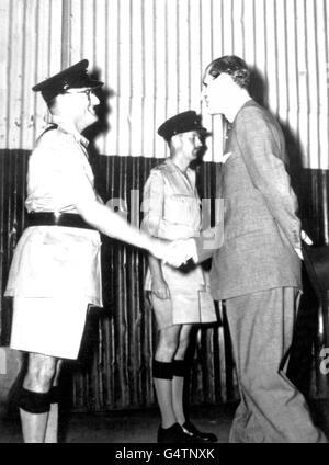 The Duke of Edinburgh and Lieutenant-Commander Parker in a canoe during ...