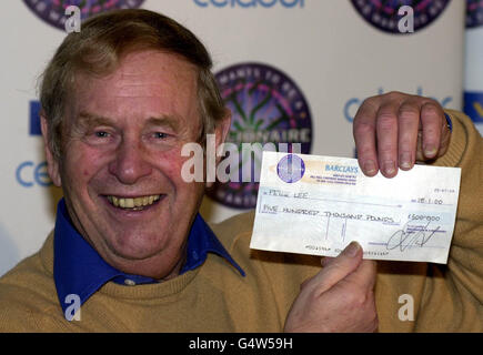 Peter Lee, from Cardigan in Wales (left) holds his cheque from TV ...