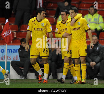 Burnley's Charlie Austin (right) celebrates scoring against Barnsley ...