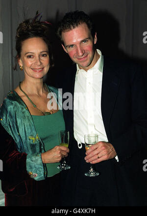 Actor Ralph Fiennes and his partner, actress Francesca Annis, arrive at ...