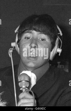 The Troggs with lead singer Reg Presley (R) and bassist Pete Staples (L ...