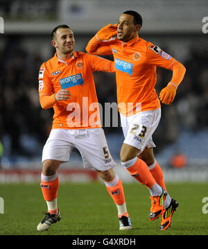 Blackpool's Neal Eardley (left) and Sheffield Wednesday's Ryan Lowe ...