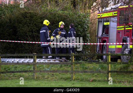 Firefighters outside the home of Tory MP Michael Colvin after fire ...