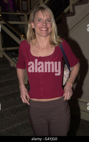 TV Presenter Anna Walker in Fiji with uniformed schoolgirls Stock Photo ...