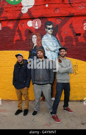 Artists, from left, Neil Edward, Hadley Ever and Sam Bates unveil the ...