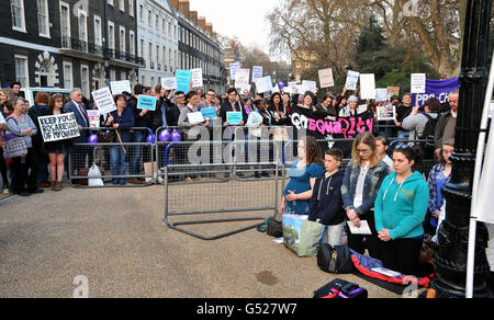 Protesters chant slogans as they take part in a demonstration against ...