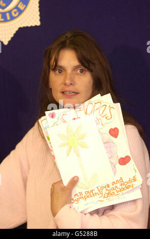Mother and daughter showing their drawings Stock Photo - Alamy