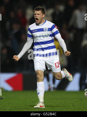 Queens Park Rangers' Jamie Mackie applauds the traveling fans after the ...