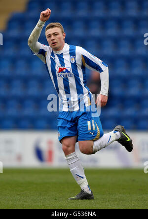 Freddie Sears of Colchester United celebrates scoring his sides first ...
