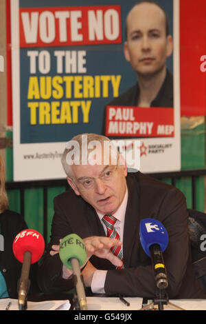 Socialist TD Joe Higgins speaking at a press conference in support of ...