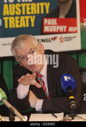 Socialist TD Joe Higgins speaking at a press conference in support of ...