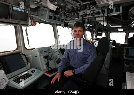 Captain Andrew Betton Commanding officer of HMS Ocean (left) with LT ...