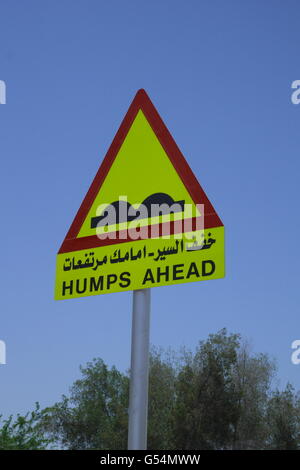 Road sign warning of speed humps for the next half mile in a town in ...