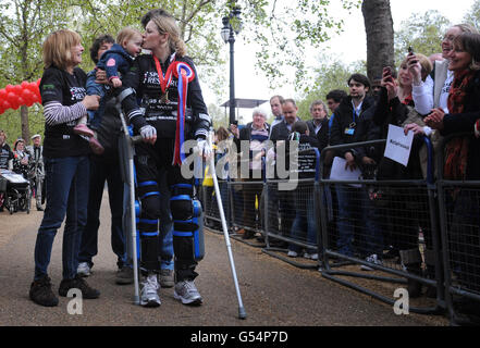 Claire Lomas, 32, who is paralysed from the chest down, wears a bionic ...