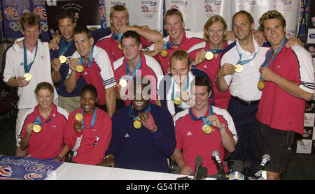 From left, Steven Foster, Ben Foster and Gillian Kirwan Foster arrive ...