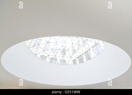 Skylight in the roof of the old factory hall. Natural ceiling light in ...