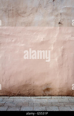 Aged weathered pink street wall background Stock Photo - Alamy