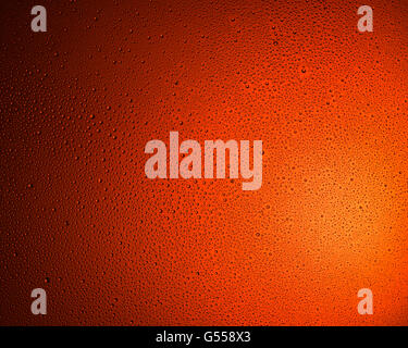 drops of red liquid in glass beaker Stock Photo - Alamy