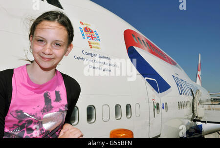 Katherine Dewar aged 10, from Chester, sits in the captain's seat of a ...
