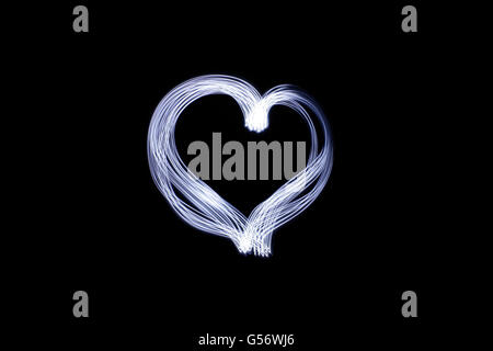 Photograph of a heart drawing made with long exposure light effect ...