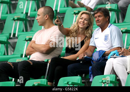Joe Hart's wife Kimberly (centre) in the stands before the UEFA Euro ...