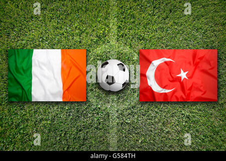 Ireland vs. Turkey flags on green soccer field Stock Photo - Alamy