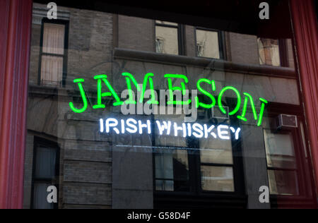 Neon Jameson Irish whiskey sign in a NYC bar window Stock Photo - Alamy