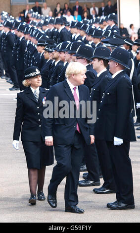Mayor Boris Johnson reviews some of the newly graduated police officers ...