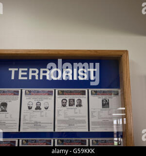 View of a display listing the FBI's 10 most wanted fugitives on a wall ...