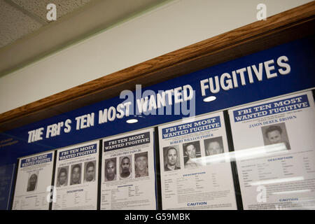 View of a display listing the FBI's 10 most wanted fugitives on a wall ...