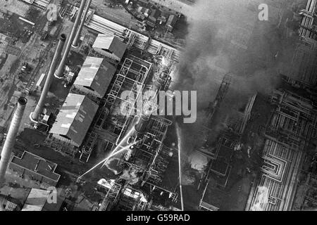 Smoke continues to rise from the heart of the great Shell Haven oil ...