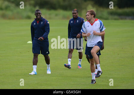 Great Britain's Craig Dawson (right) and Uruguay's Gaston Ramirez ...