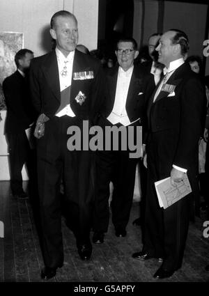 The Duke of Edinburgh and Lieutenant-Commander Parker in a canoe during ...