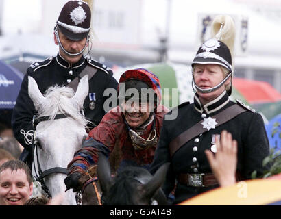 Jockey Richard Guest pats his mount Red Marauder after winning the 2001 ...