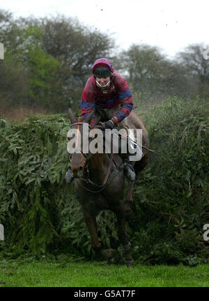 Richard Guest on Red Marauder leads in to the winners enclosure after ...