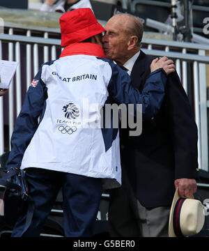 The Duke of Edinburgh greets Princess Anne as he arrives to watch the ...