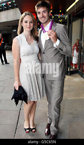 Zac Purchase and fiancee Felicity Hill attend Carousel at The Barbican ...