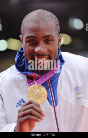 France's Teddy Riner won the Gold medal in the Men + 100kg Judo event against Japan's Hiroshi ...